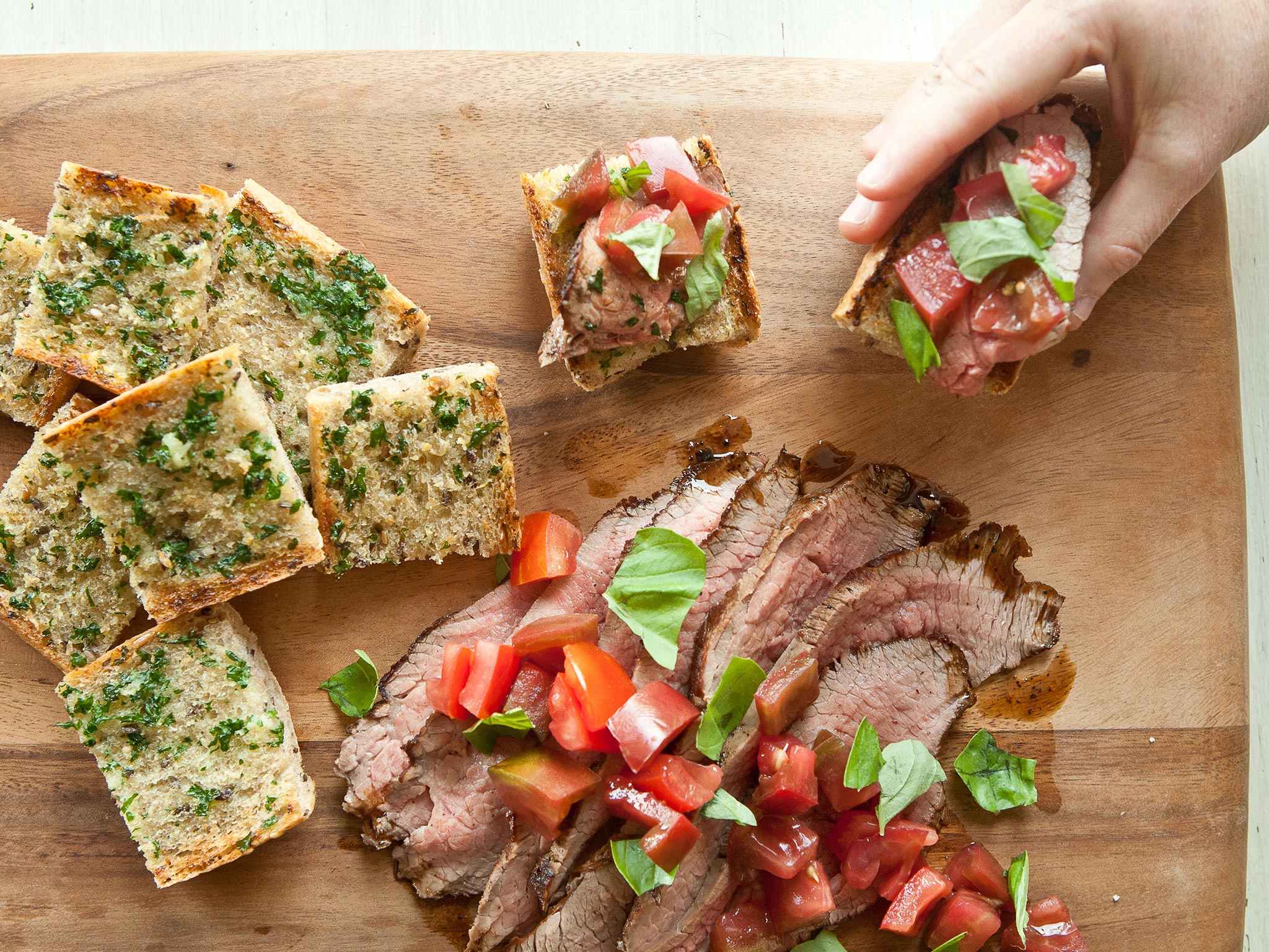 Recipe: Tri-Tip Steaks with Tomatoes, Basil and Garlic Bread | Whole ...